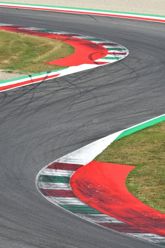 Curbs on a racing track stock image. Image of asphalt - 392266583
