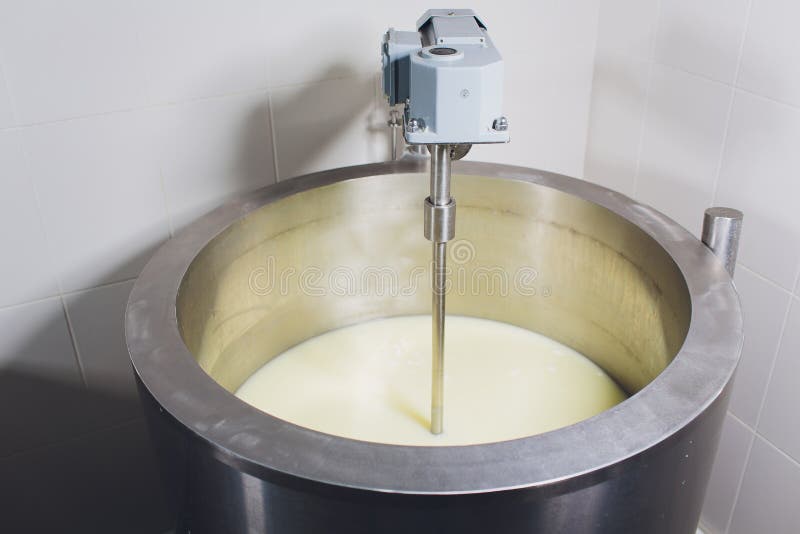 Curdled Milk Brought To High Temperature for the Production of Cheese ...