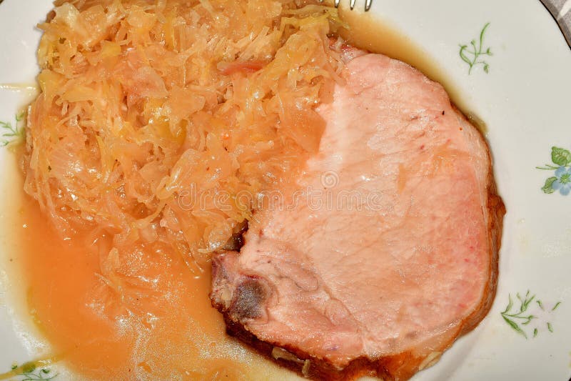 Cured Cooked Pork from the Cutlet String and Sauerkraut Stock Photo ...