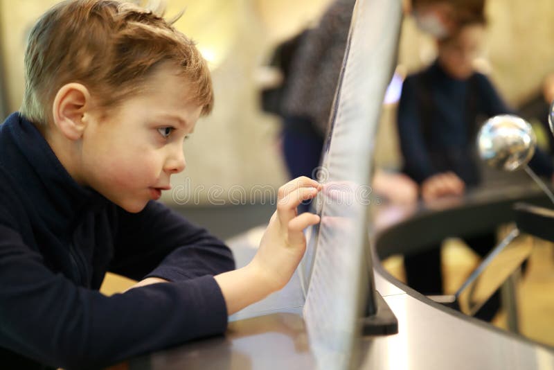 Curiosity Child Touching Glowing Map Stock Photo - Image of creative ...