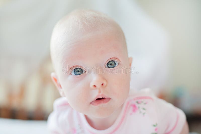 Curious Baby Girl Looks at the Camera Stock Photo - Image of happy ...