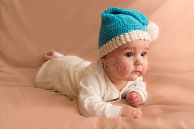 Curious child in blue cap stock image. Image of life - 52687485