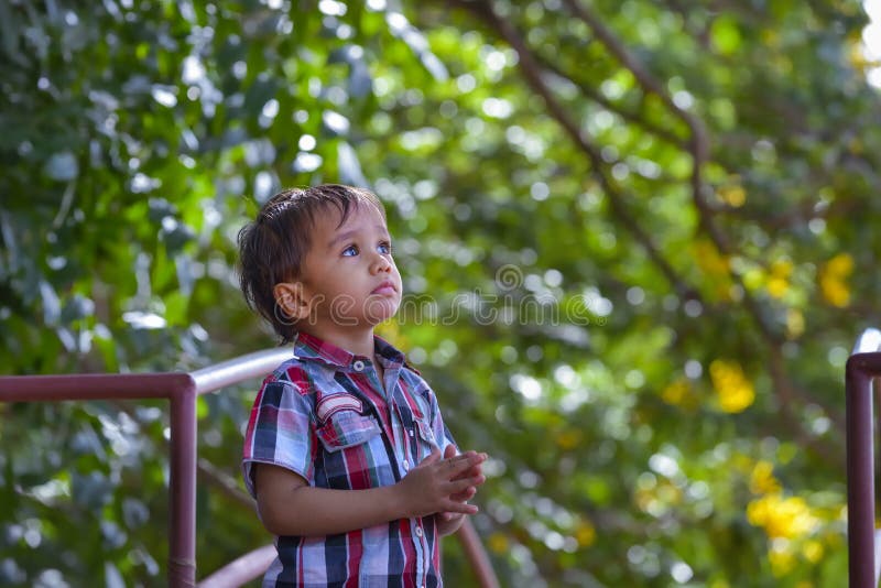 Curious child stock image. Image of look, play, praying - 47359593