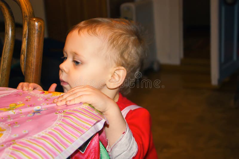 Curious Child Looking at the Festive Table at Home Stock Photo - Image ...
