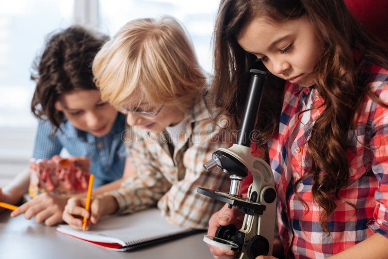 Curious Students Attentively Looking on the Model in Teacher Hands ...