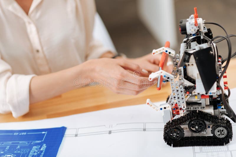 Curious Engineer Testing Futuristic Robot in the Office Stock Image ...