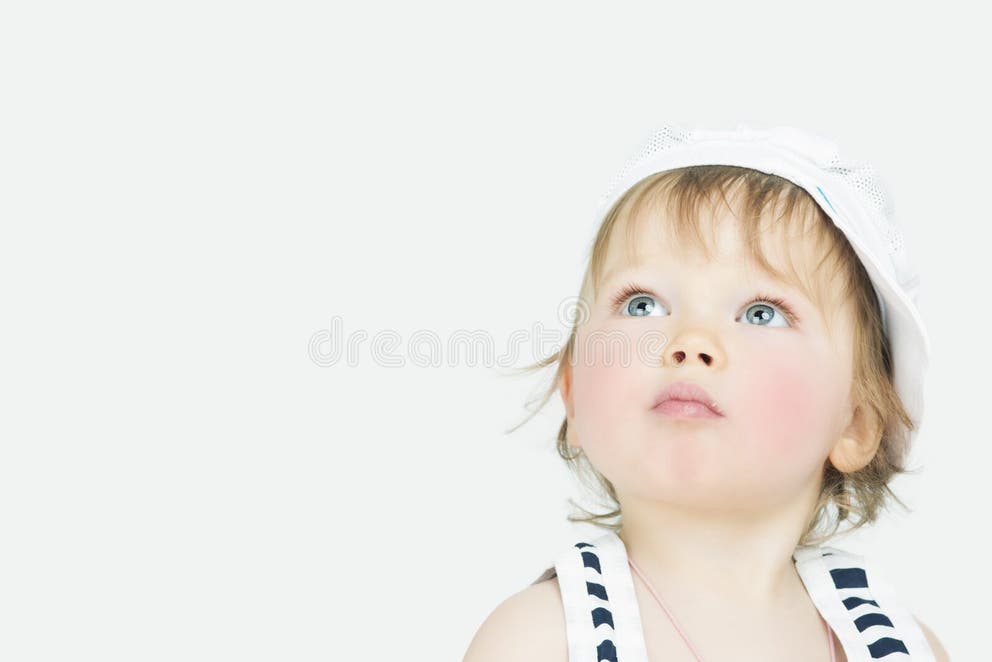 Curious Expression of Little Girl in Cap Stock Image - Image of ...