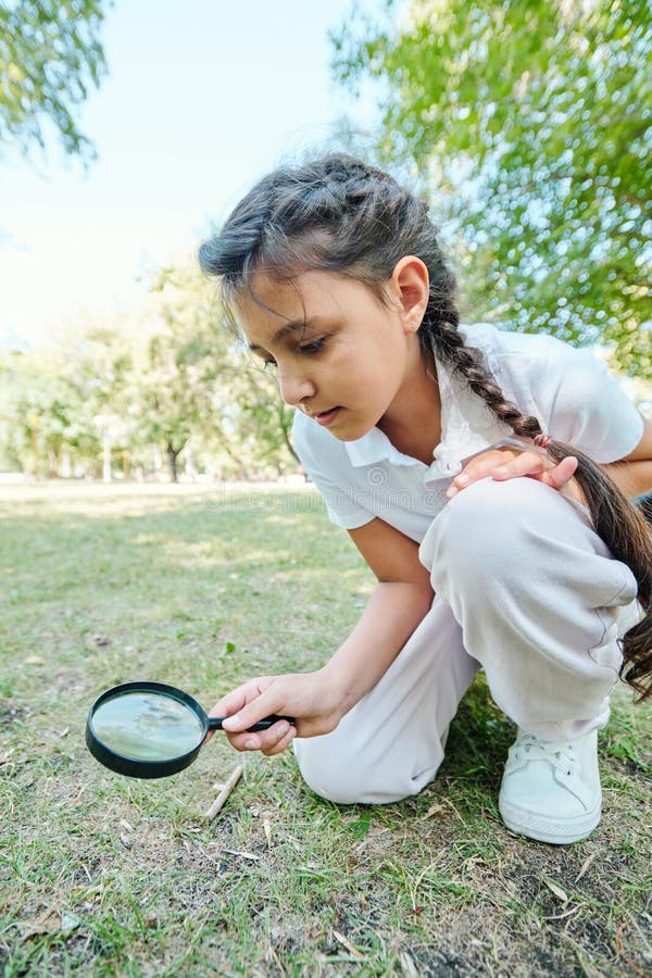 Curious Girl Studying Soil Using Magnifying Glass Stock Photo - Image ... Curious Girl Studying Soil Using Magnifying Glass Stock Photo - Image ...