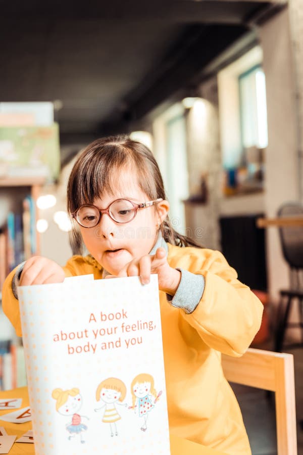 Curious Kid with Problems with Health Dealing with New Book Stock Photo ...