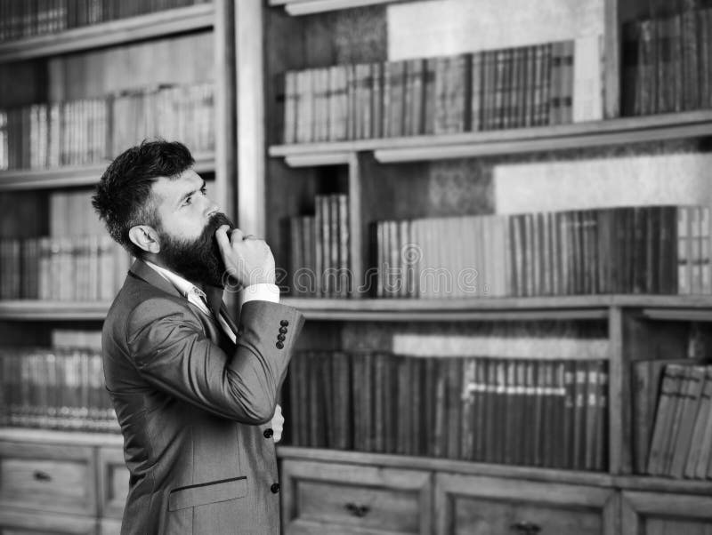 Curious man choosing book stock image. Image of indoor - 122609273