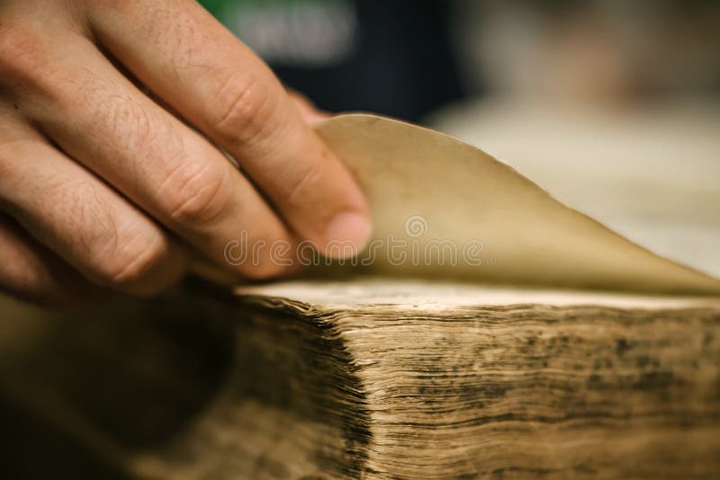 Curious Man Reading Old Book in His Library at Home Stock Photo - Image ...