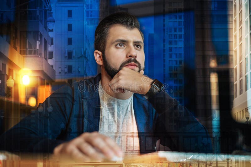 Smart Man Reading Information for His Project while Sitting Alone Stock ...