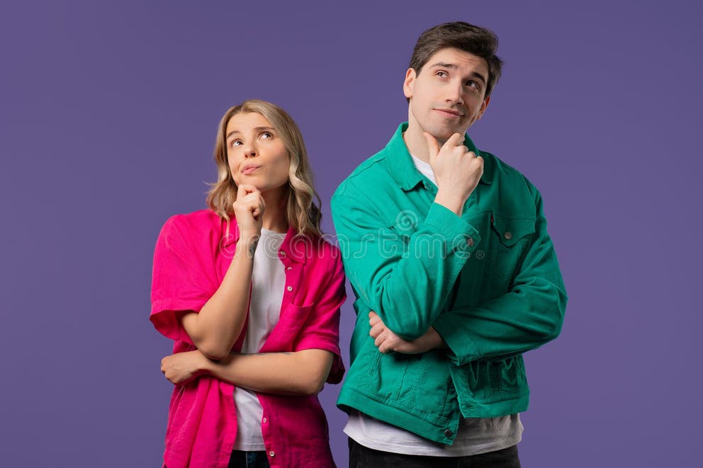 Curious Young Couple Analyzing on Violet Studio. Mindful Man Woman ...
