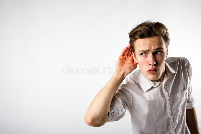 Curious young man in white stock image. Image of adult - 140977241