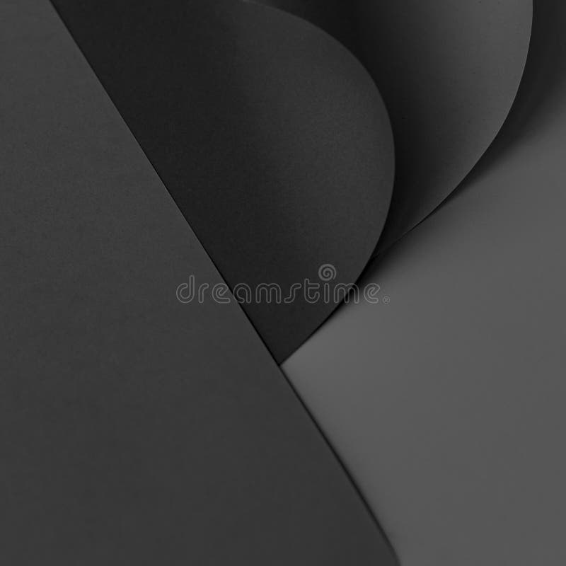 Curled Black Chart Paper on a Dark Gray Background Stock Image - Image ...