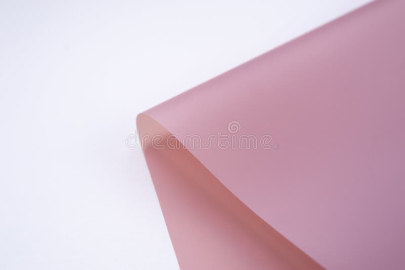 Curled Corner of Pink Paper on White Background Stock Image - Image of ...