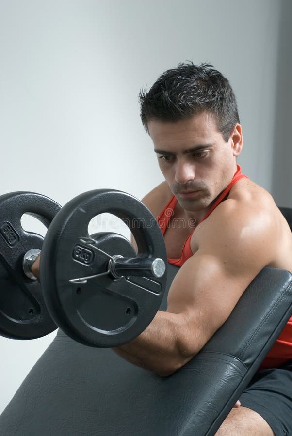 Curling a Dumbbell - Left Arm Vertical Stock Photo - Image of healthy ...