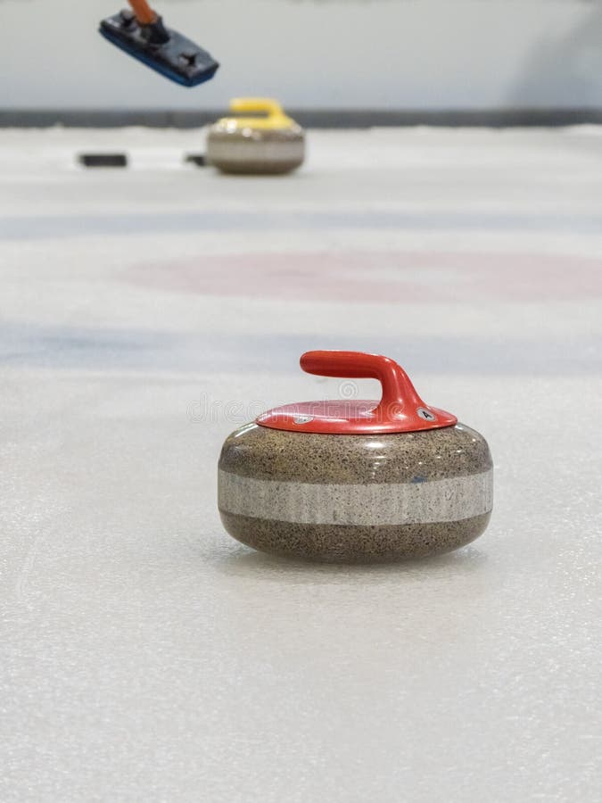 Curling Rocks on a White and Blue Rink. Stock Photo - Image of granit ...