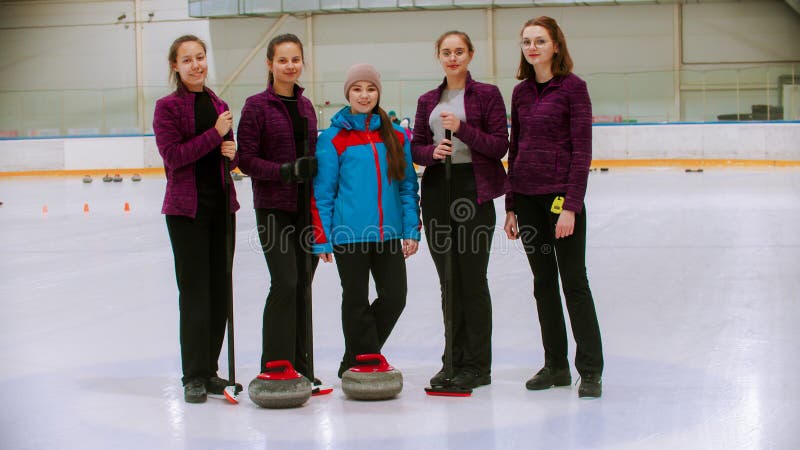 Curling Training - the Judge Standing on the Ice Rink with Her Students ...