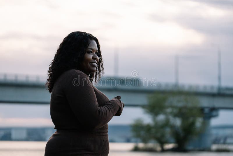 Vertical Smiling Playful Barefoot Curly Plump Full Figured Afro
