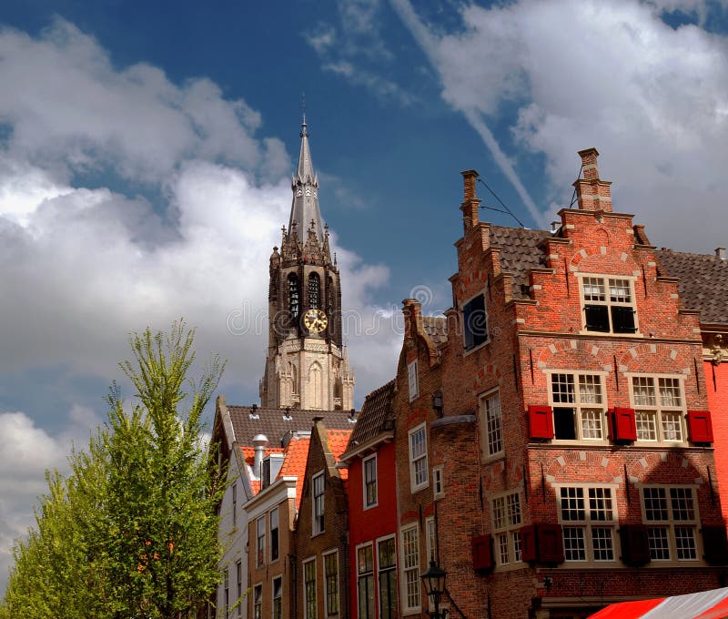 Curly Clouds Old Buildings Stock Photos - Free & Royalty-Free Stock ...