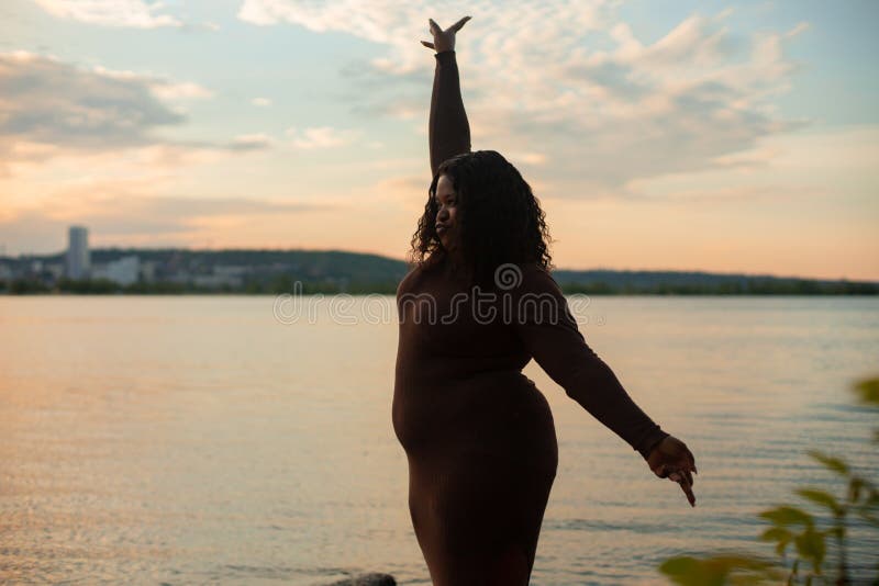 Curly Confident And Playful African Afro American Plump Black Haired
