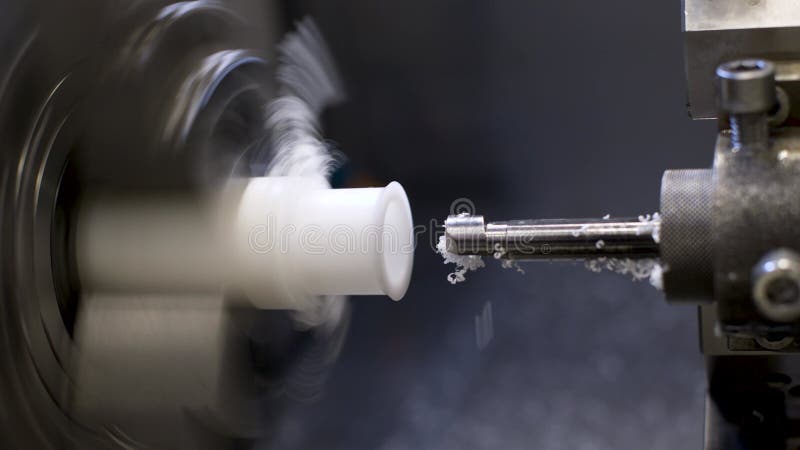 Curly Cutting Turning Work on an Automated CNC Machine. Blank of ...