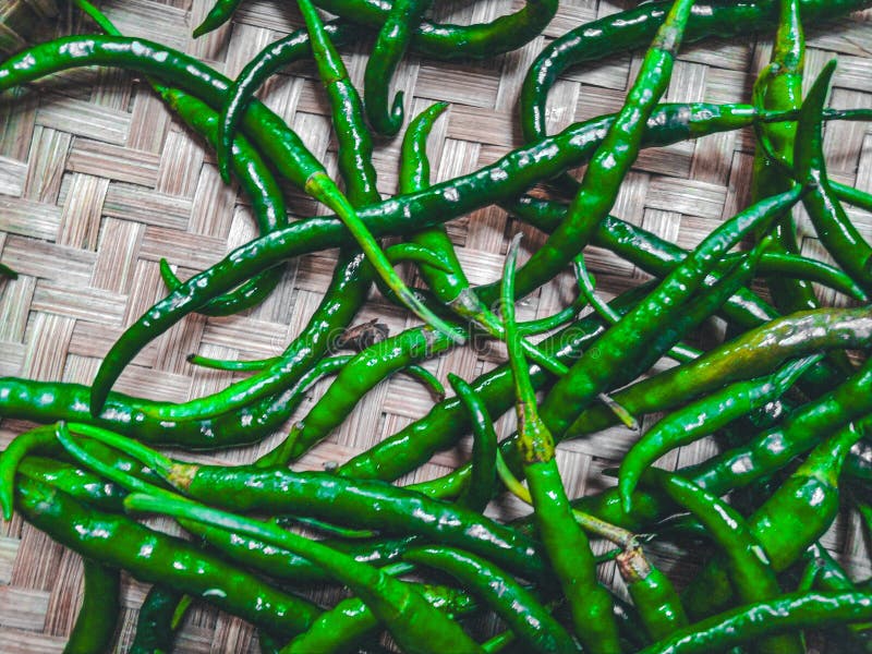Curly Green Chilies in a Woven Bamboo Container. Stock Image - Image of ...