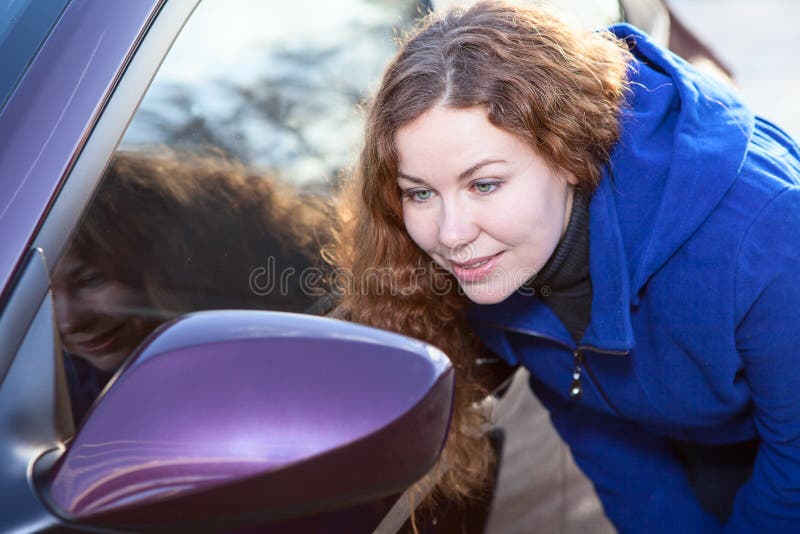 Curly Hair Woman Looking in Car Back Side Mirror Stock Photo - Image of ...
