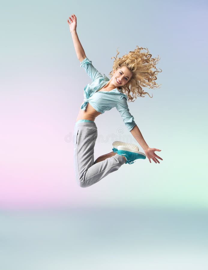 Curly-haired Athlete Woman Jumping and Dancing Stock Image - Image of ...