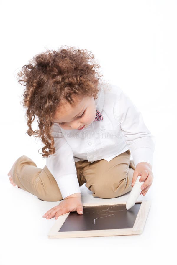 Curly Kid Practice Writing on Black Board Stock Image - Image of ...