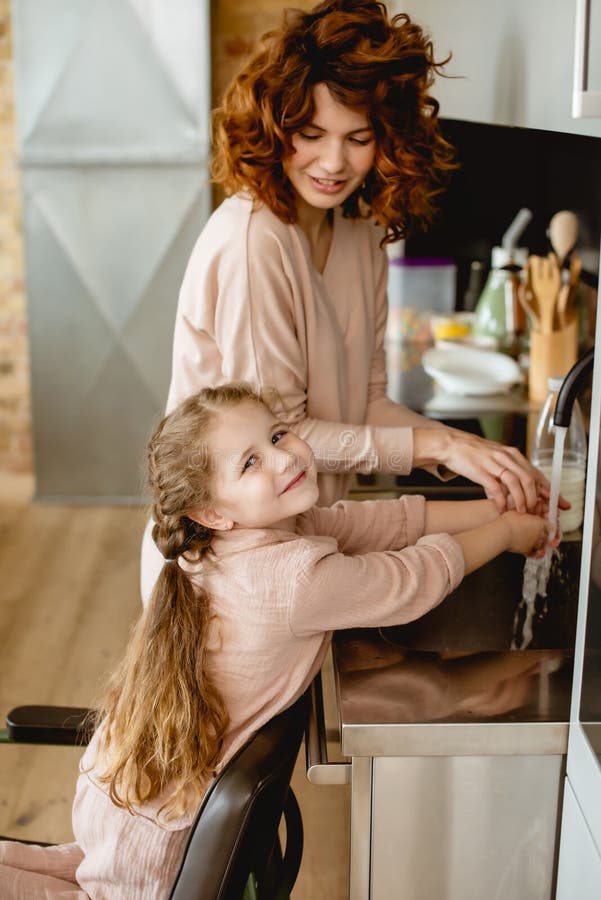 Curly Mother and Happy Daughter Washing Stock Photo - Image of ...