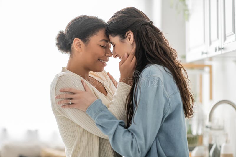 Curly Multiracial Woman Hugging Cheerful Girlfriend Stock Image Image