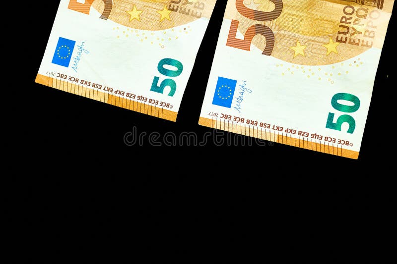 Money.Two 50 Euro Banknotes on Black Surface Stock Image - Image of ...