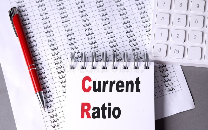 CURRENT RATIO Text on Notebook with Chart , Pen and Calculator Stock ...