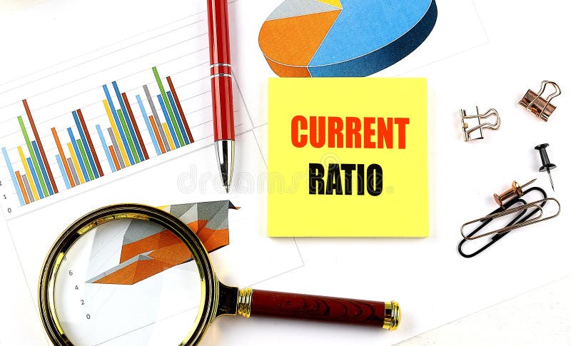 CURRENT RATIO Text on Yellow Sticky on Chart with Magnifier and Pen ...