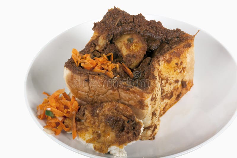Curry in Hollowed Out Bread Known As Bunny Chow Stock Image - Image of ...