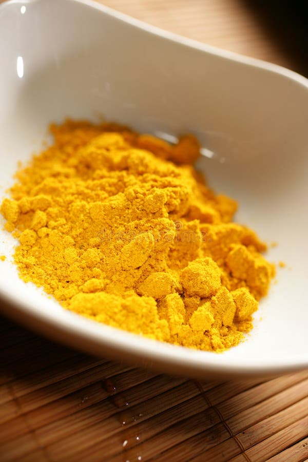 Curry powder in bowl stock photo. Image of powder, seasoning - 7908762