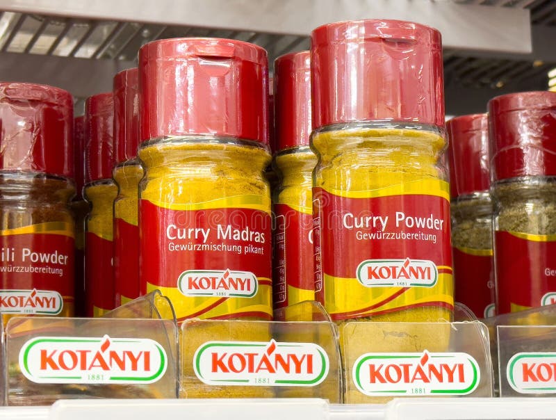 Curry Powder Display in Grocery Aisle Featuring Various Spice Brands ...