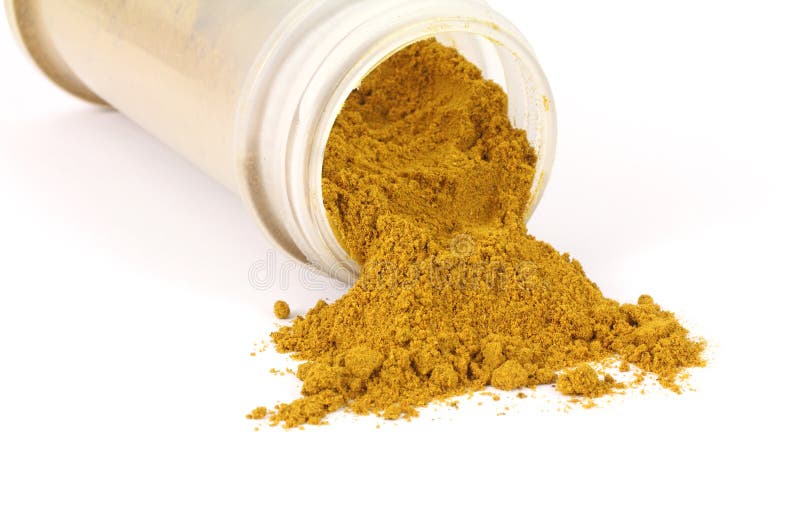 Curry powder spilling stock image. Image of container - 18533101