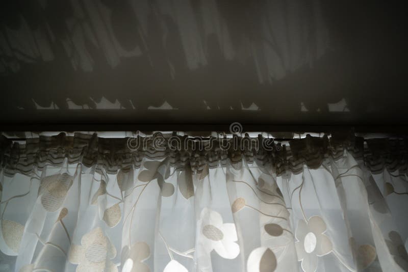 Curtains Under the Ceiling are Ruffled. with Floral Pattern. a Stiff ...