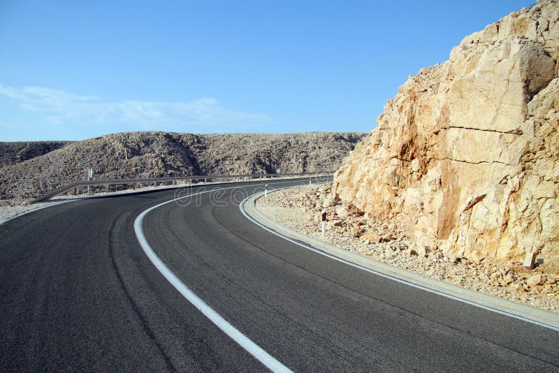 Curve on the road stock photo. Image of highway, rock - 26427978