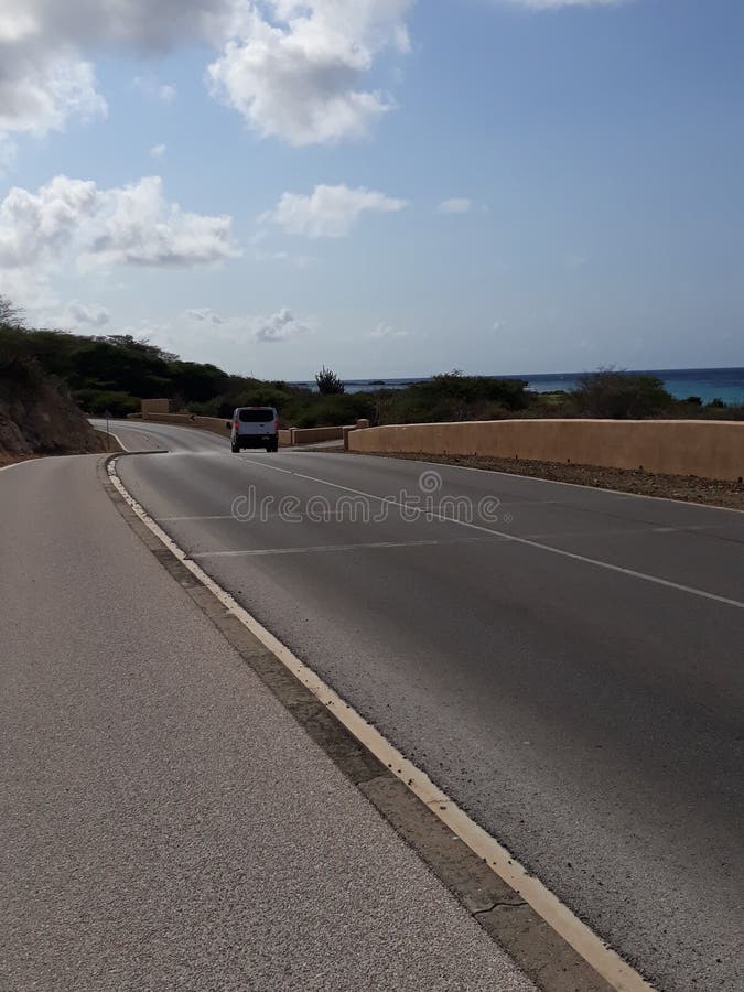 Curve road see side hills stock image. Image of hills - 175534789