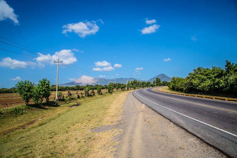 Curve Road View with Volcano Stock Photo - Image of park, view: 75203920