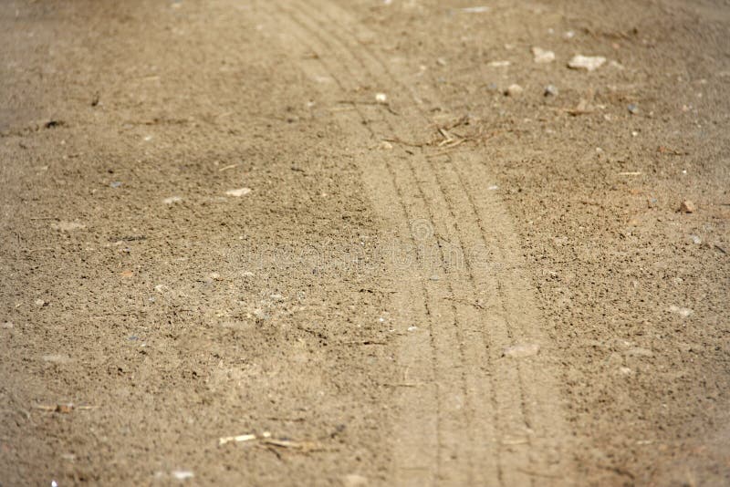 Curve tire tracks on Soil stock photo. Image of brown - 30709470