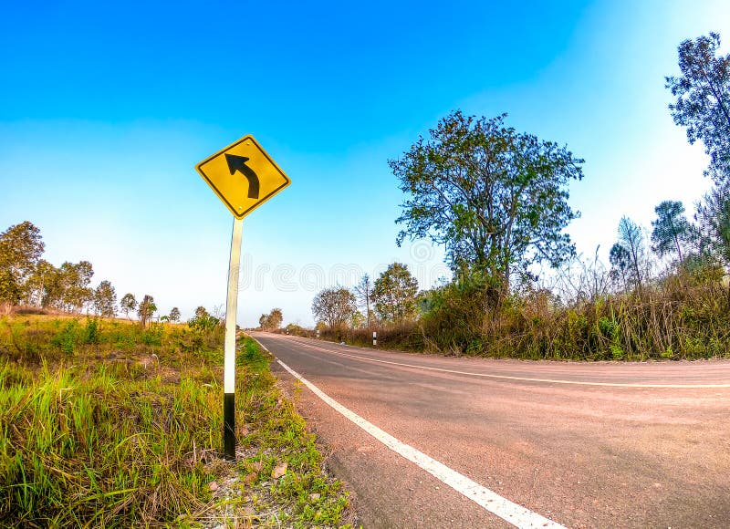 Highway Sign - Curve To The Left Stock Photo - Image of yield ...
