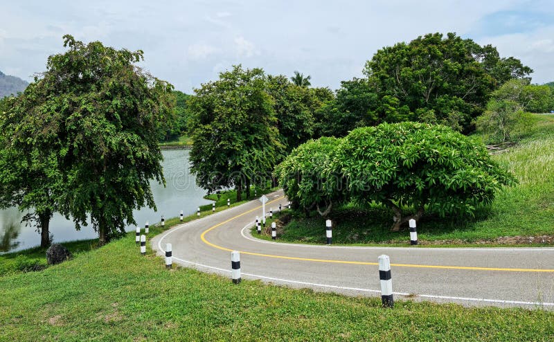 Curve way with trees lawn stock image. Image of city - 284787287