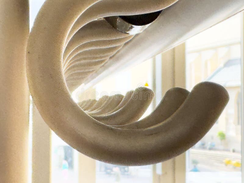 Curved Architectural Design with Repeated Loops in Sunlit Space Stock ...