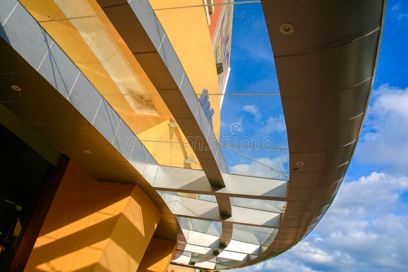 Curved Architectural Design of Modern Building Against Blue Sky with ...