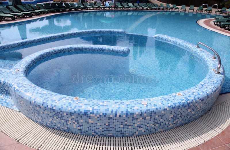 Curved Blue Tiled Swimming Pool Stock Photo - Image of curve, floor ...